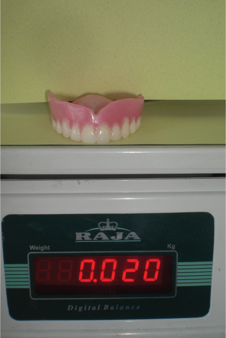 Weight of denture made with conventional manner